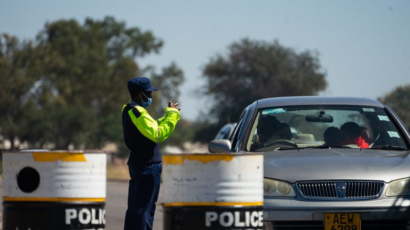 Cop injured as fleeing kombi driver crashes Hiace onto roadblock drums ...